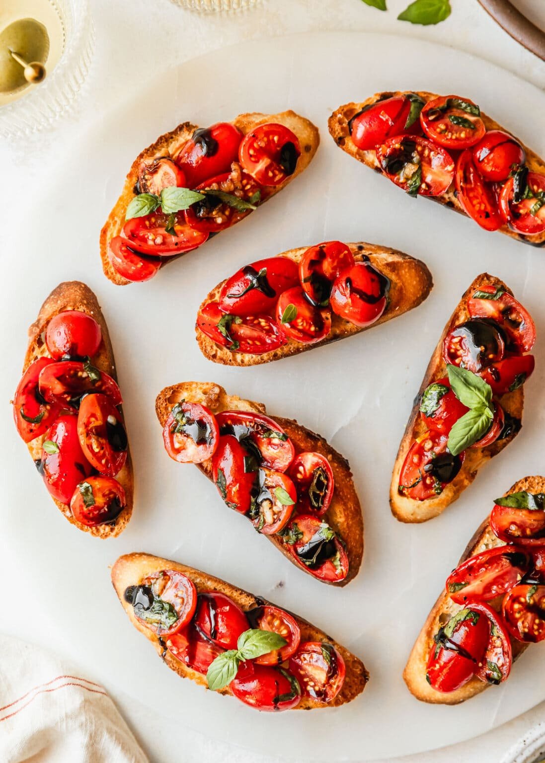 Gorgeous Tomato Bruschetta on Garlicky Crostini • Sunday Table