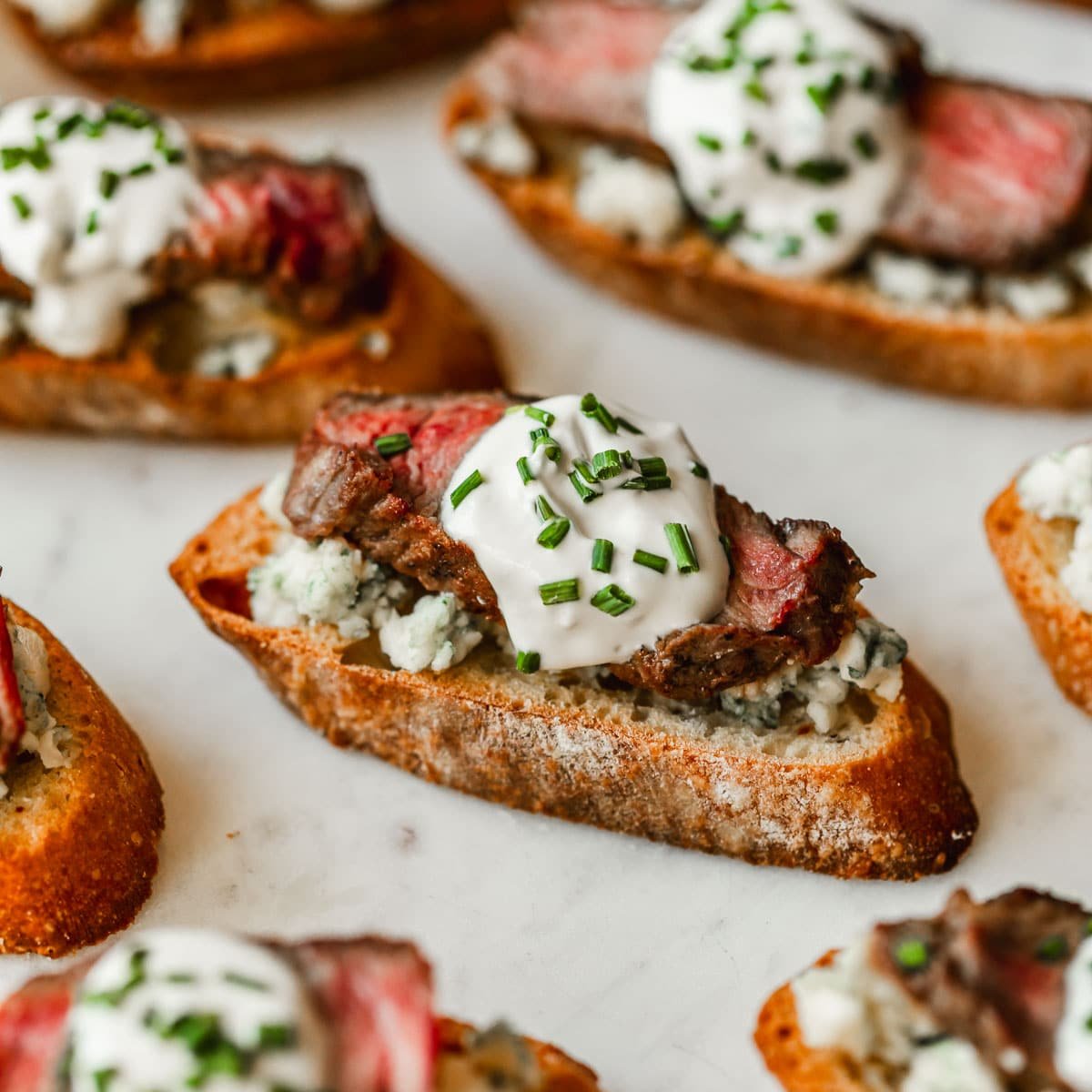 Steak Crostini with Blue Cheese & Garlic Sauce • Sunday Table